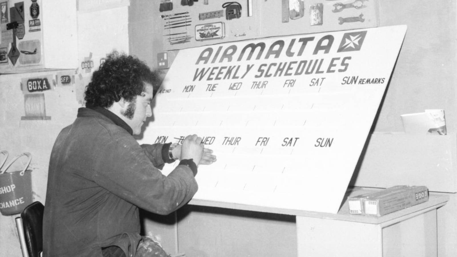 Wow! Check out this nostalgic photo of hand-painted flight information ...
